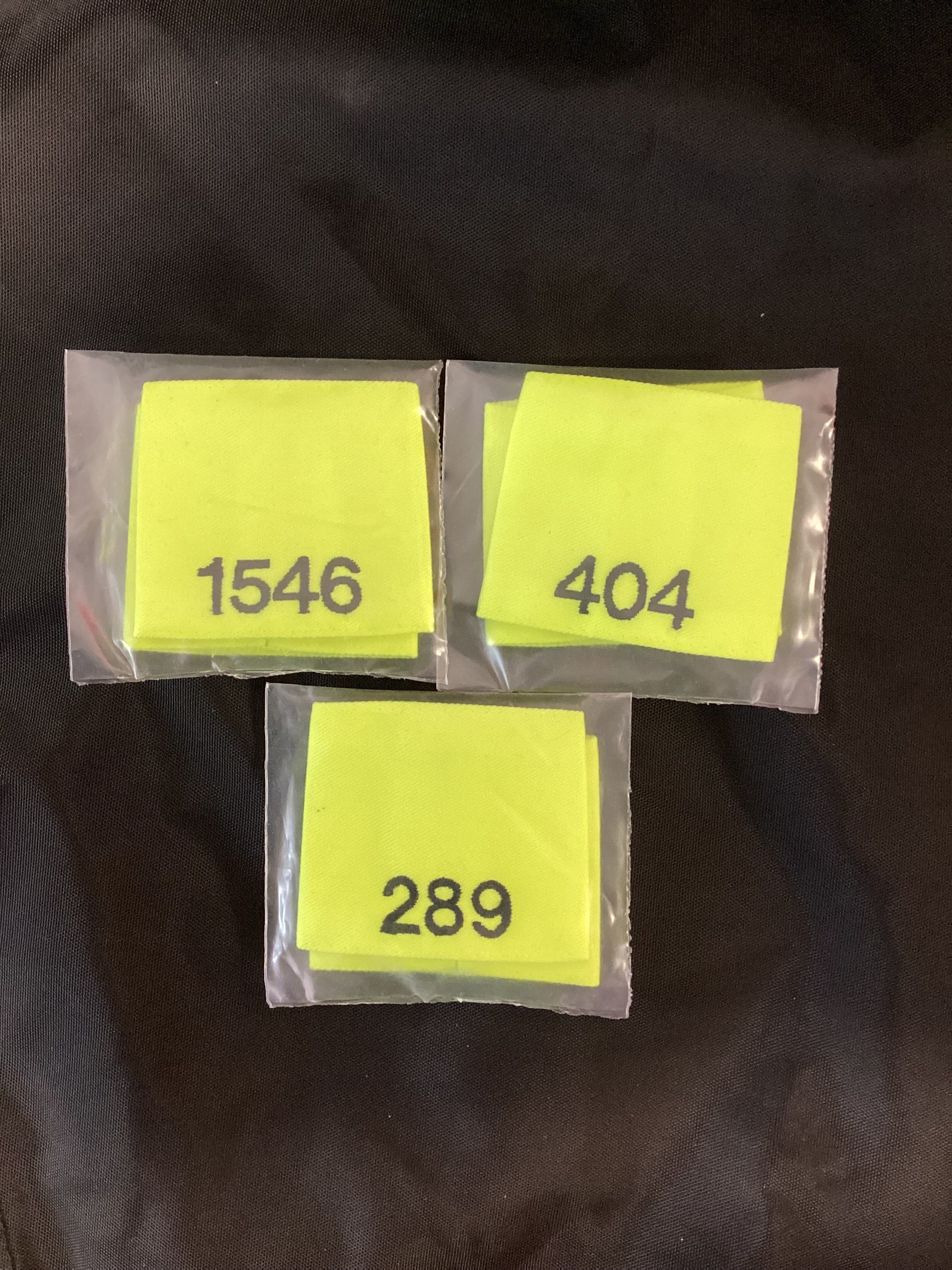 Epaulette Slides, Hi Vis yellow, black embroidered mixed numbers and l ...